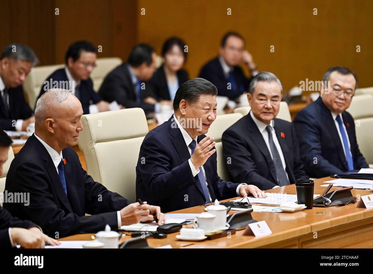 China's President Xi Jinping, second left, and Foreign Minister Wang Yi, second right, attend a ...