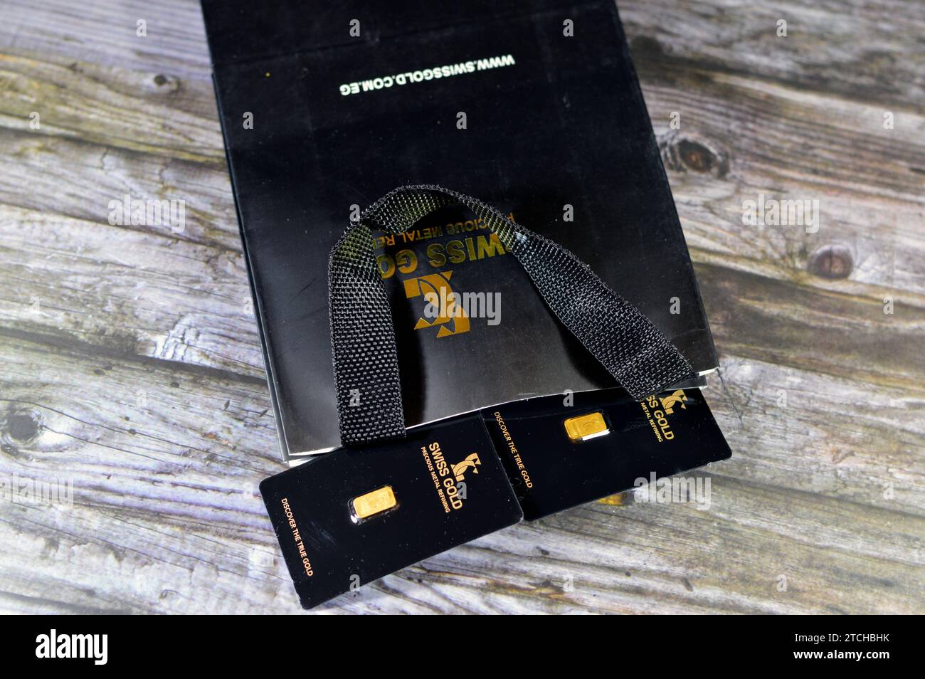 Cairo, Egypt, December 10 2023: Swiss Gold 24 Karate pure yellow gold ...