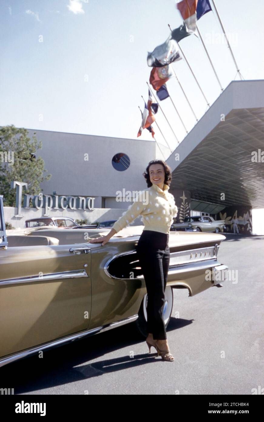 LAS VEGAS, NV - 1958: Actress and model Kitty Dolan poses next to a ...