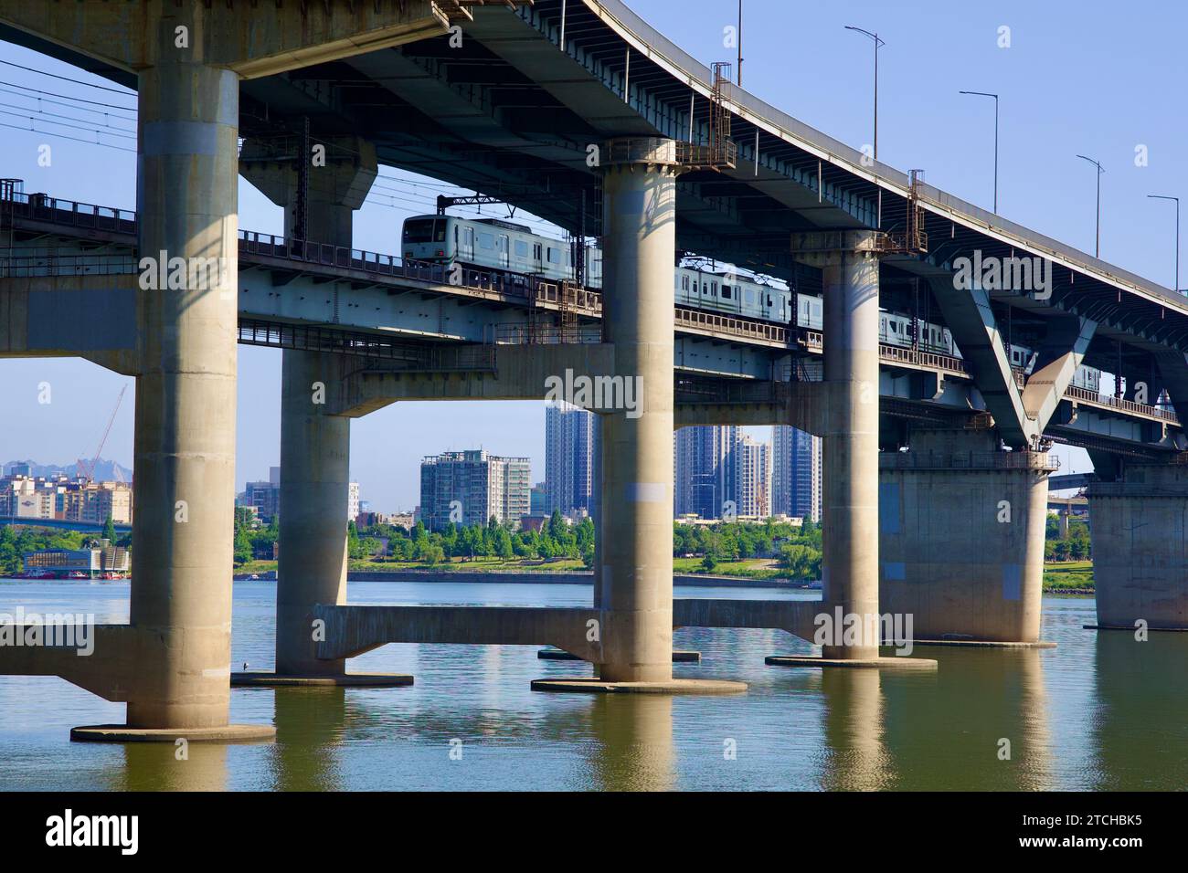 Seoul, South Korea - June 2, 2023: A subway train crosses the lower ...