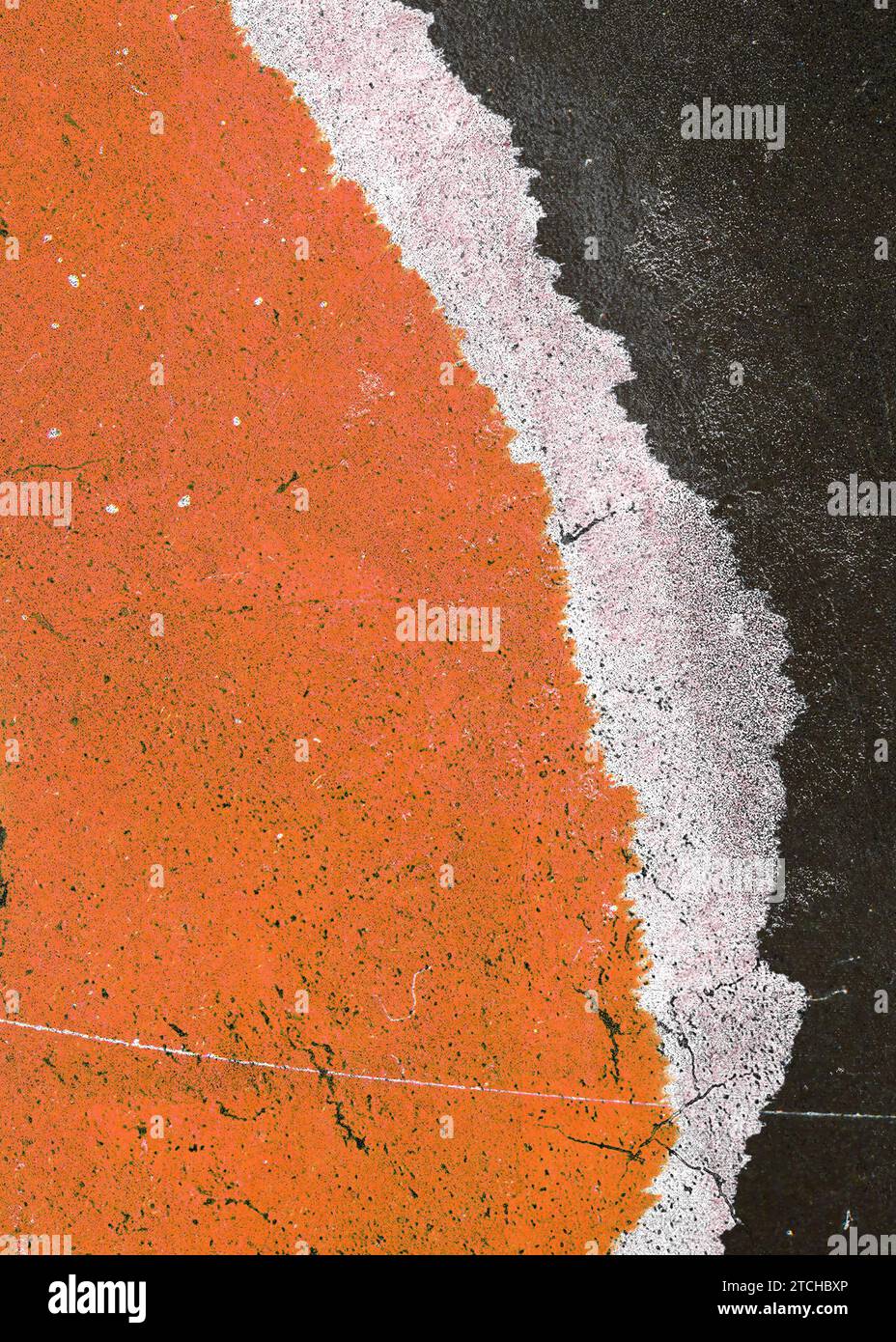 Torn a half sheet of orange paper from the side to bottom half ...