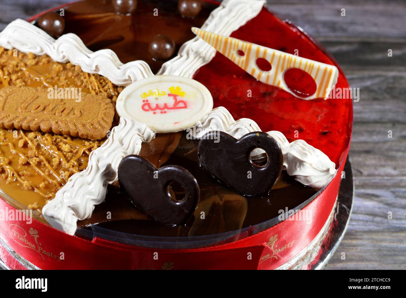 Cairo, Egypt, December 5 2023: Thebes Pastry and Bakery cake, four different quarters spongy ...