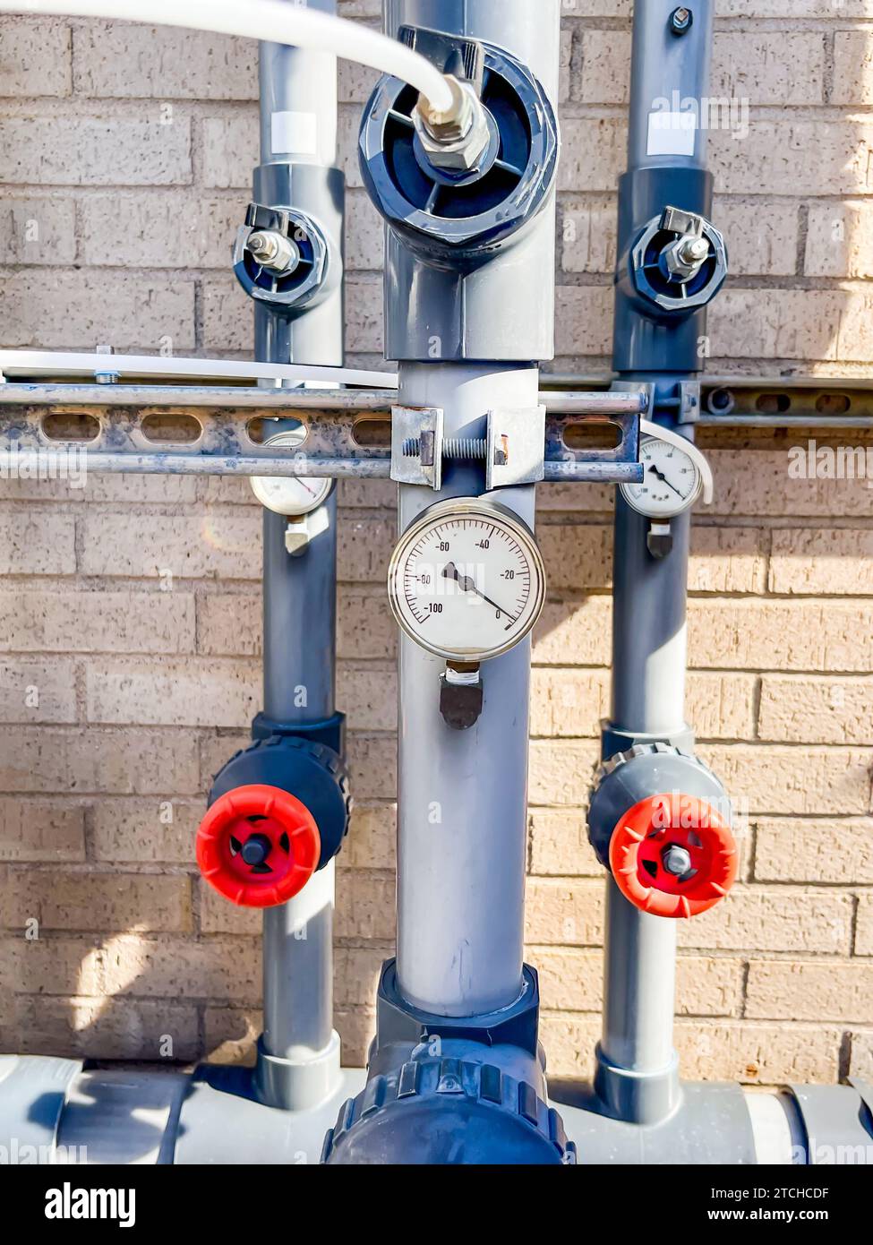 soil vapor extraction test well header with pressure gauge and sample ...