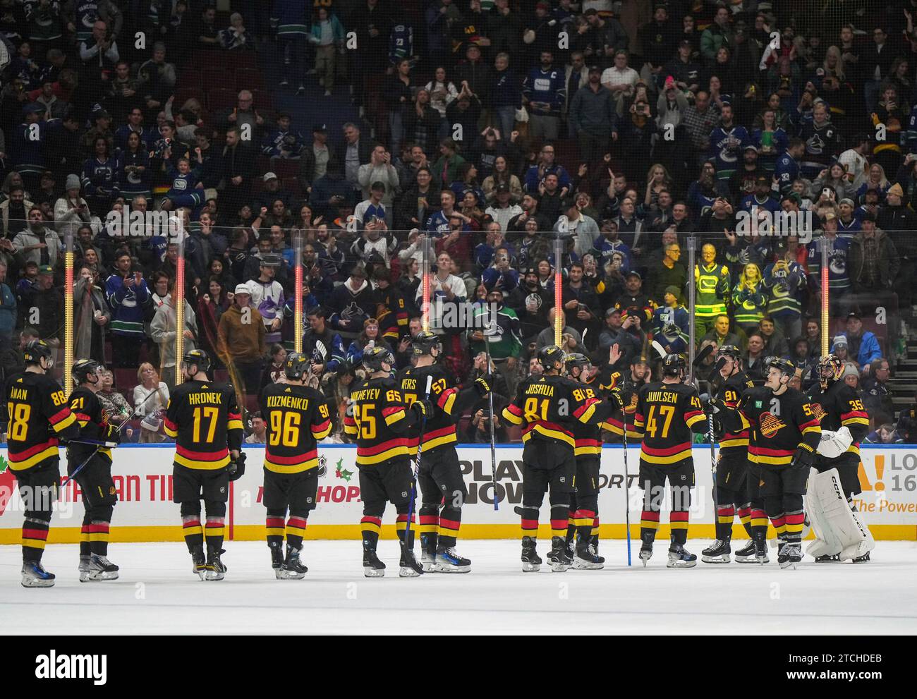 Vancouver Canucks players celebrate after defeating the Tampa Bay ...
