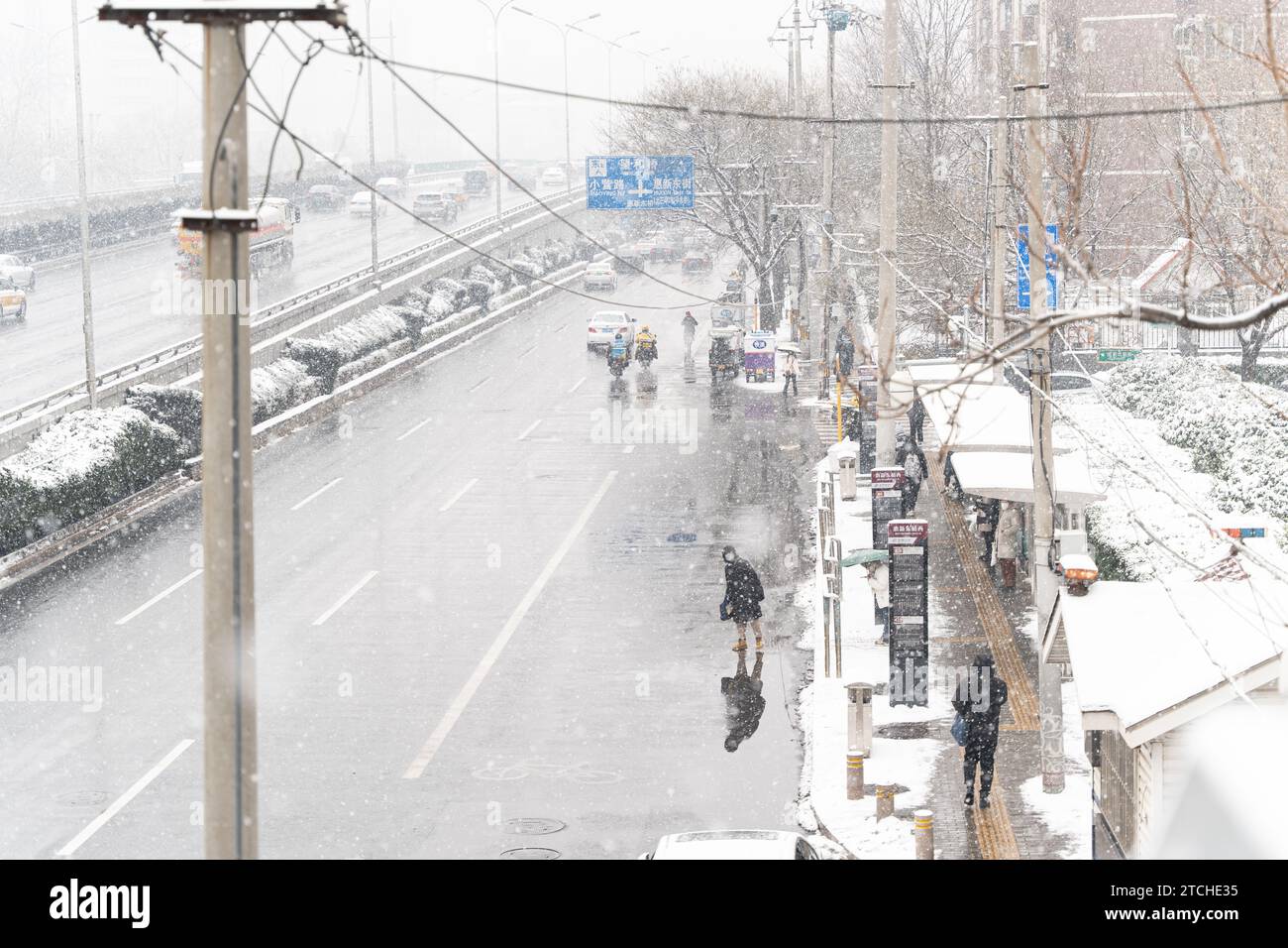 Beijing, China. 13 Dec, 2023. People of Beijing in a snowstorm, commute ...