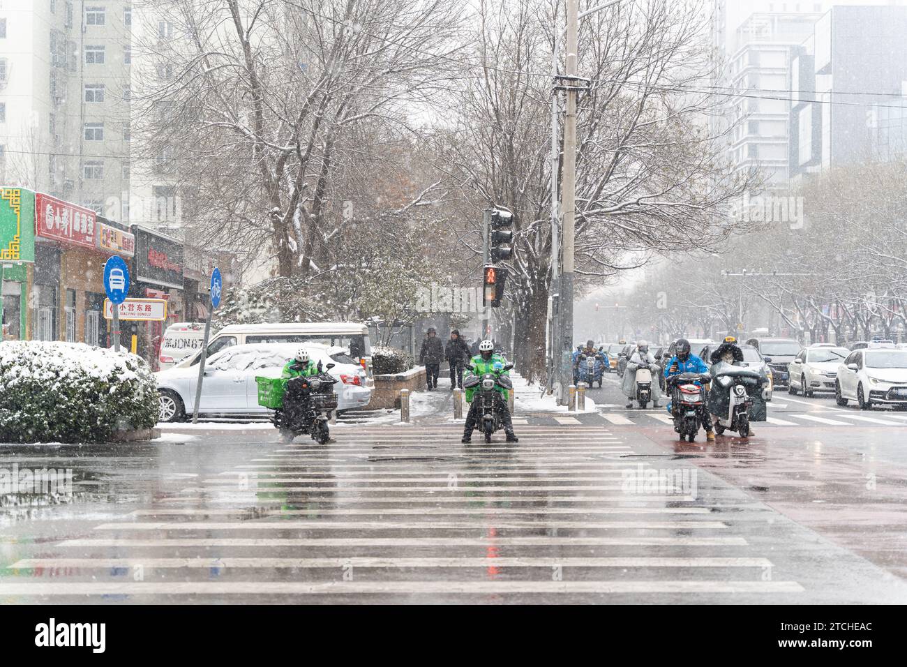 Beijing, China. 13 Dec, 2023. People of Beijing in a snowstorm, commute ...