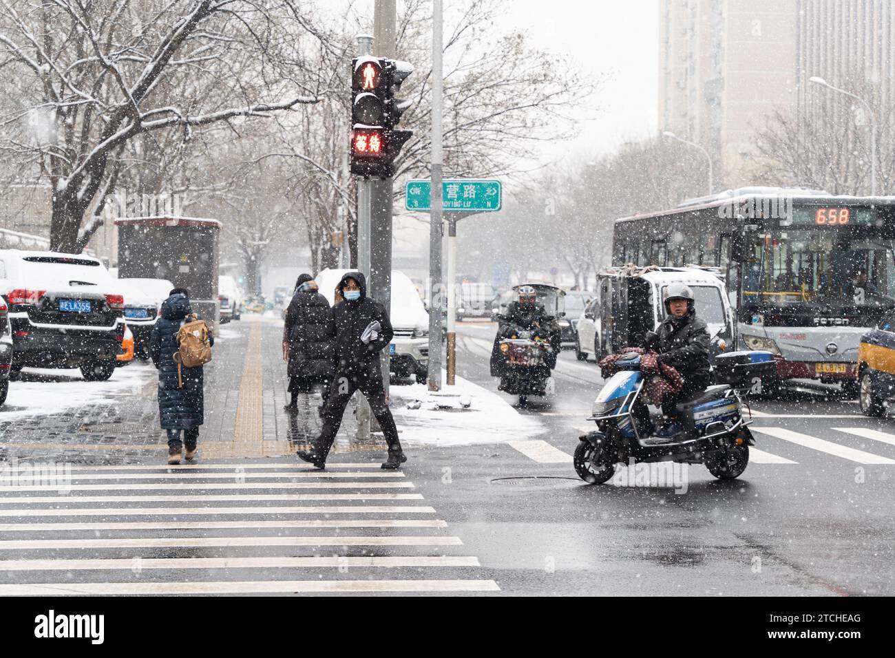 Beijing, China. 13 Dec, 2023. People of Beijing in a snowstorm, commute ...