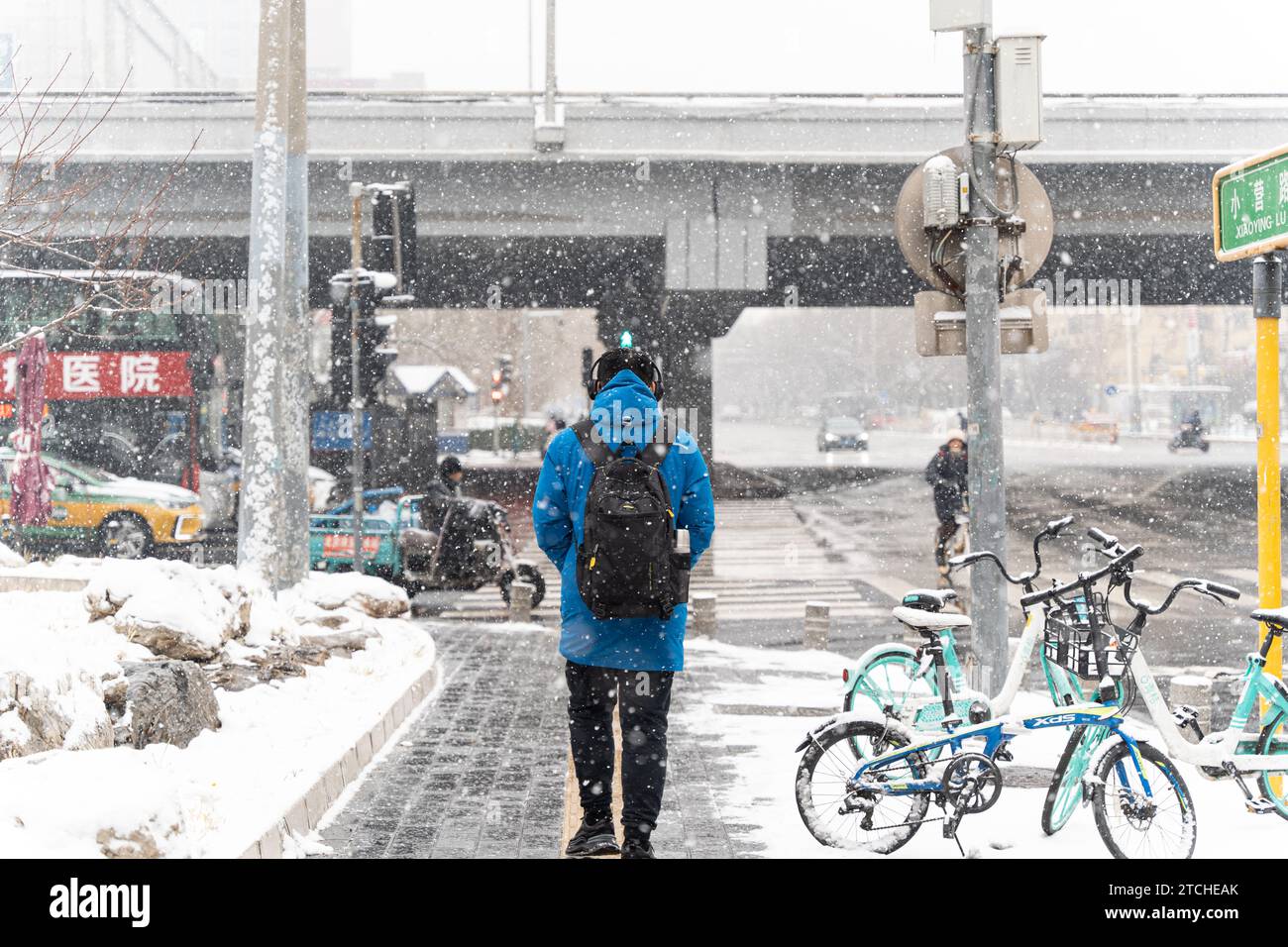 Beijing, China. 13 Dec, 2023. People of Beijing in a snowstorm, commute ...