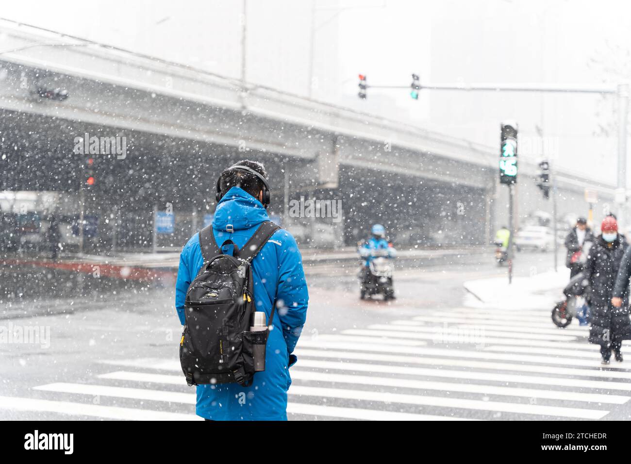 Beijing, China. 13 Dec, 2023. People of Beijing in a snowstorm, commute ...