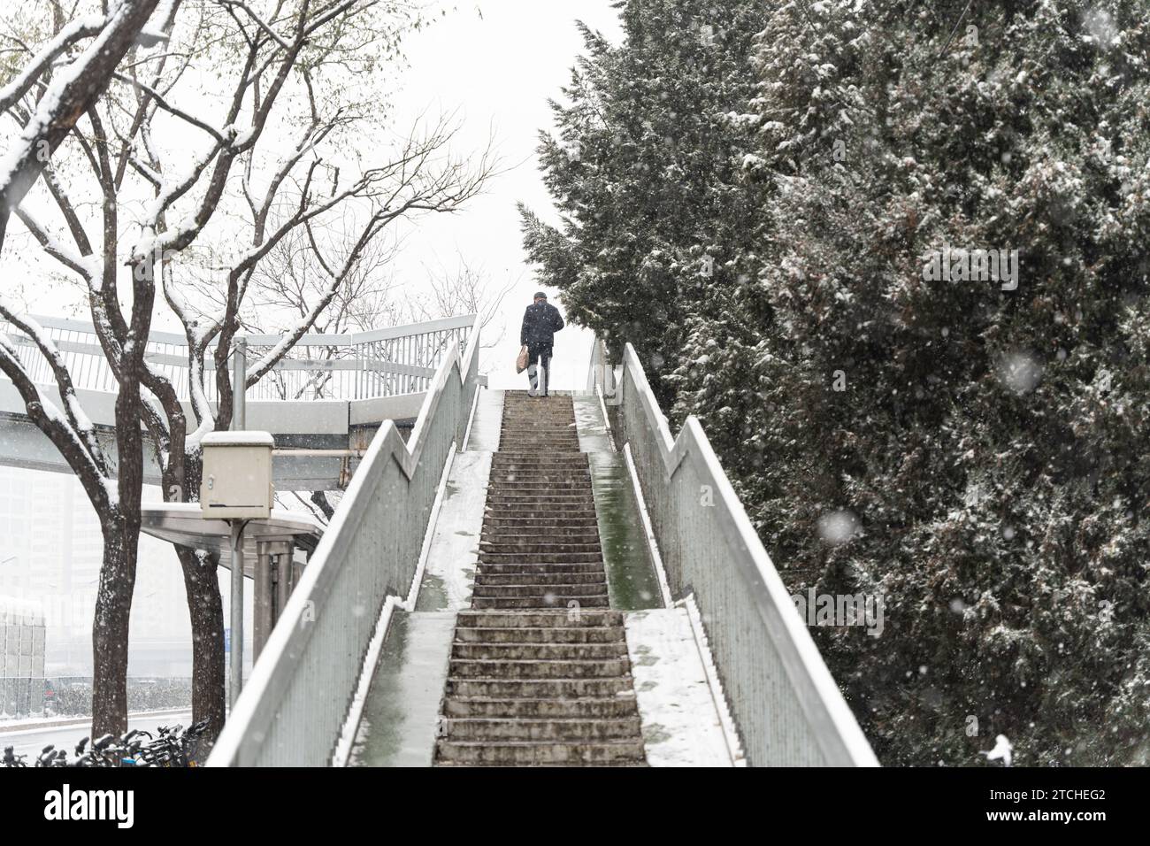 Beijing, China. 13 Dec, 2023. People of Beijing in a snowstorm, commute ...