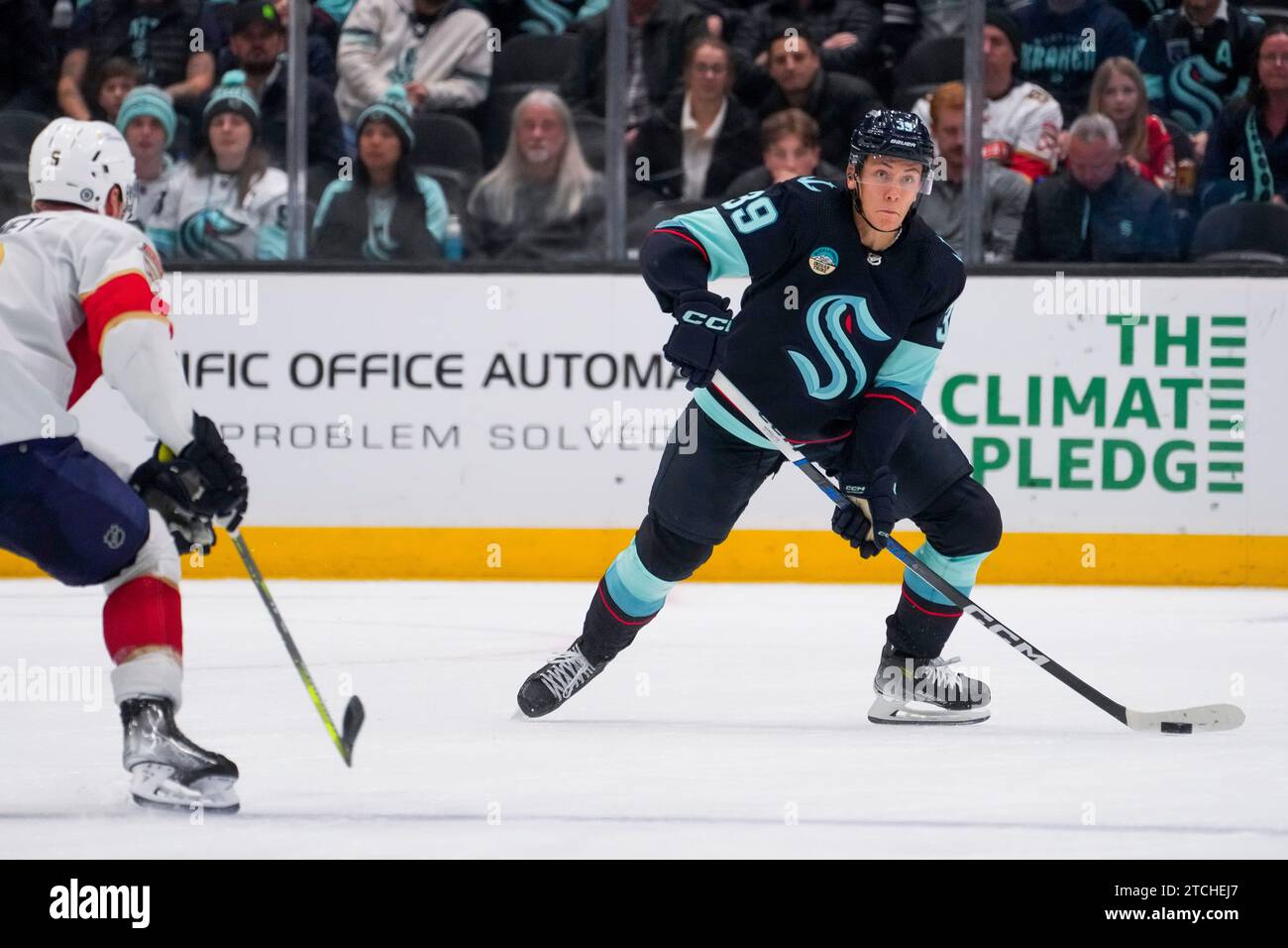 Seattle Kraken defenseman Ryker Evans (39) looks to pass against ...