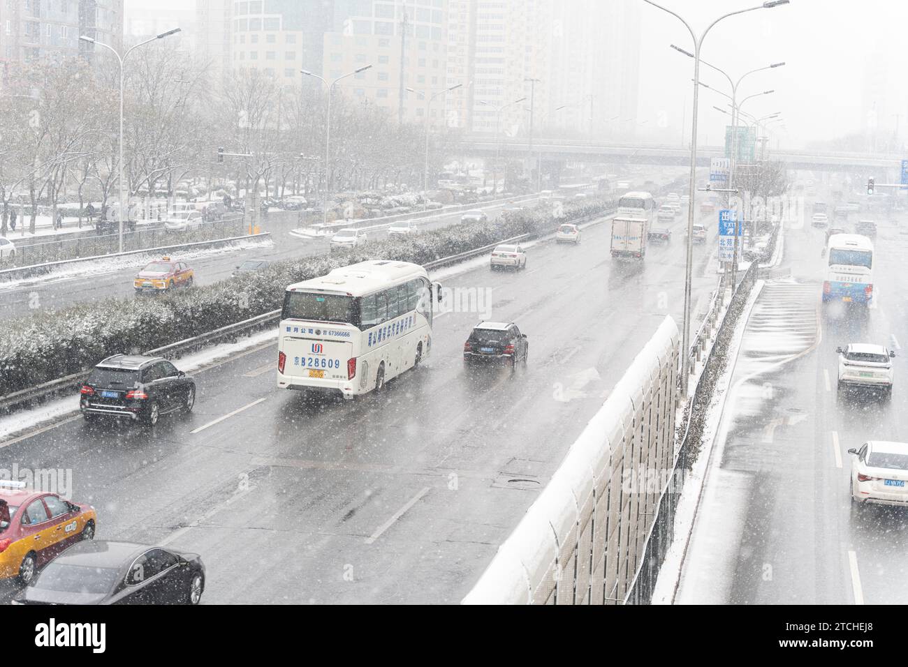 Beijing, China. 13 Dec, 2023. People of Beijing in a snowstorm, commute ...