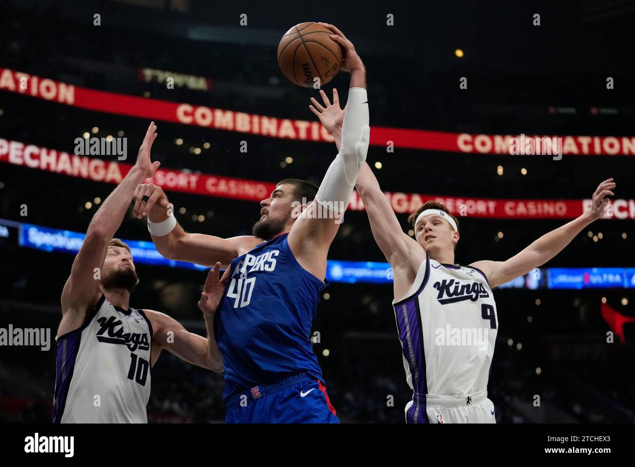 Los Angeles Clippers center Ivica Zubac (40) dunks against Sacramento Kings forward Domantas ...