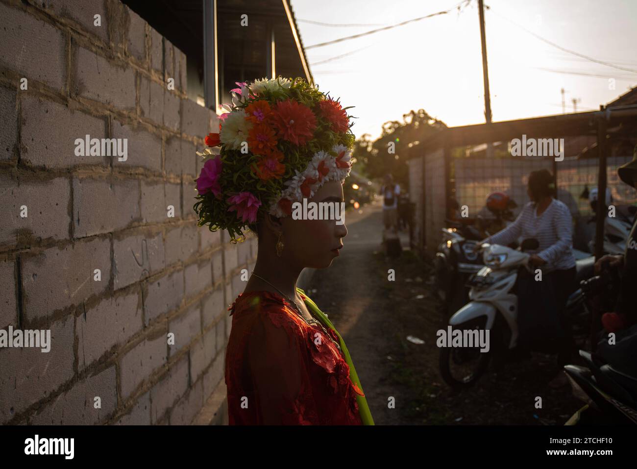 NGAROT FESTIVAL Girls decorated with flowers on their heads participate ...