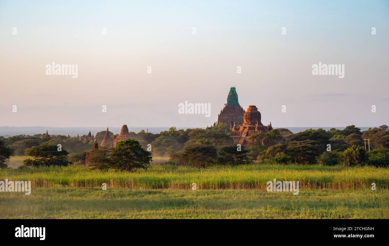 A beautiful landscape of farmlands, forests, and Buddhist temples in ...