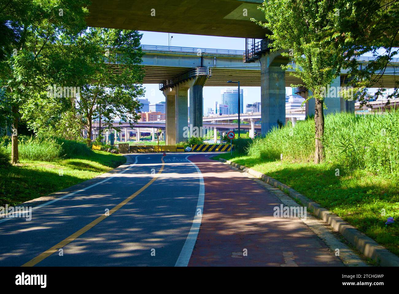 Seoul, South Korea - June 2, 2023: A peaceful bike path under a bridge ...
