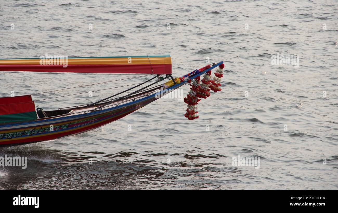 A medium-sized boat floating serenely in a tranquil lake Stock Photo ...