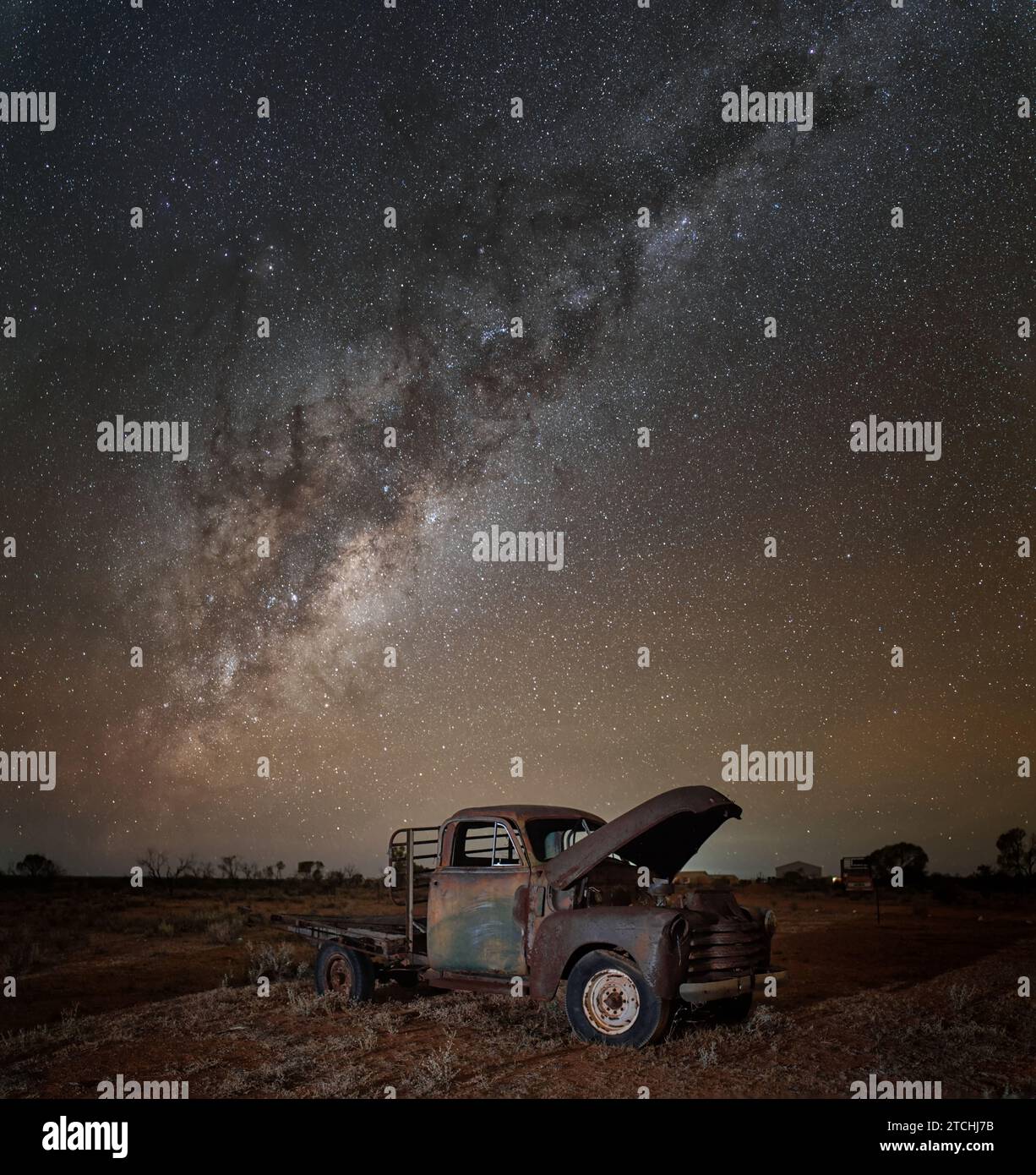 Milky Way core rising above an old farm wagon Stock Photo - Alamy