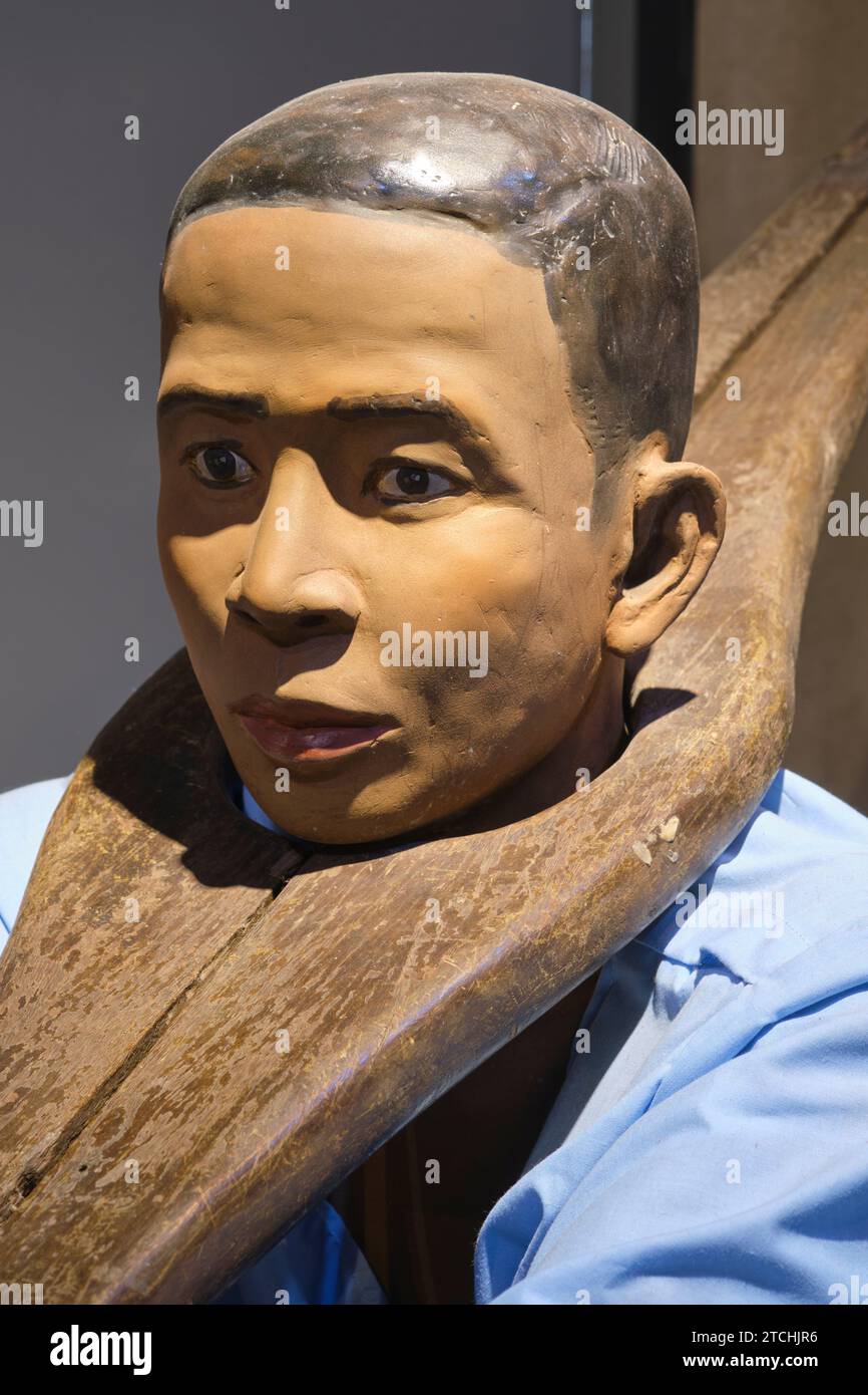 A display of a typical prisoner, locked in a Ta-ngok, a bamboo collar ...
