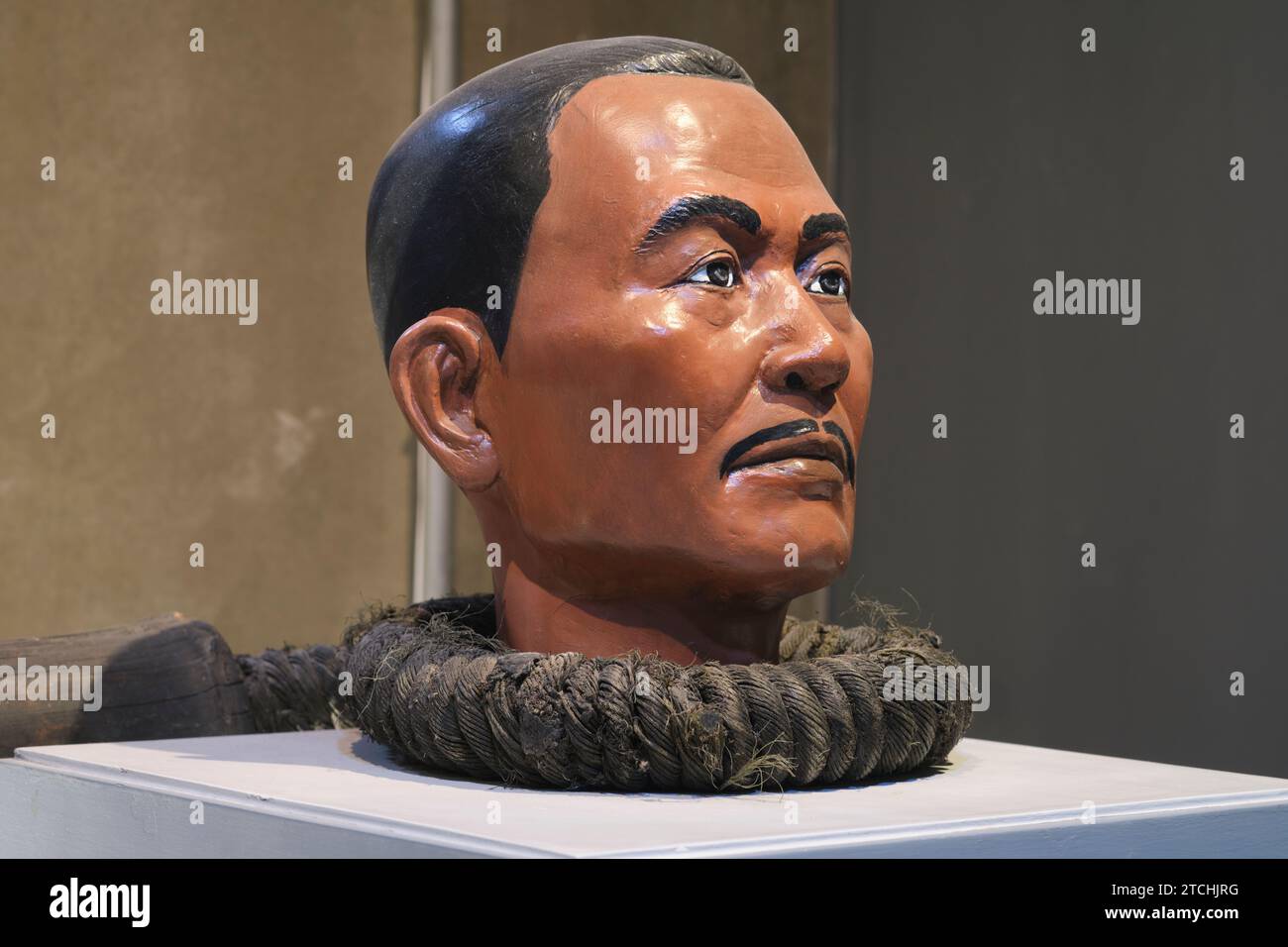 A display of a typical prisoner, locked in a klang, a rope neck noose ...