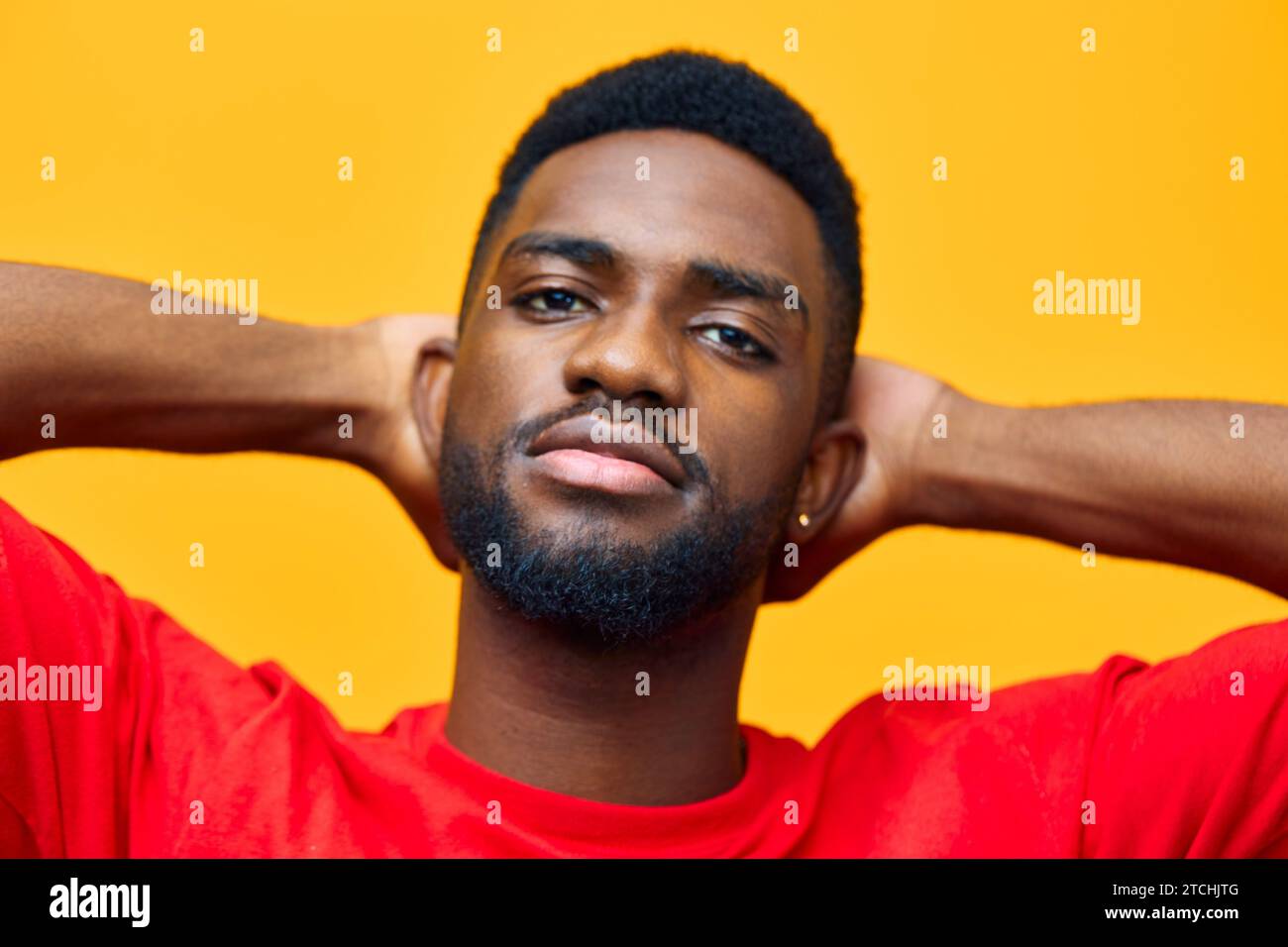 Happy young African American gen z guy isolated on beige background ...