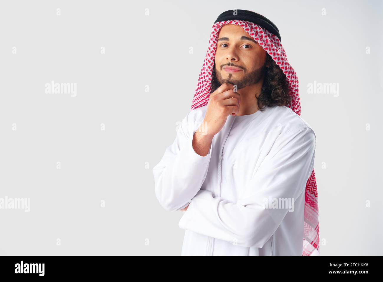Portrait of a young Arab man wearing middle-eastern traditional dress ...
