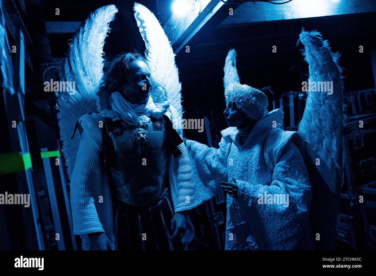 An actor playing Archangel Gabriel and Angel Gabriel is helped into ...