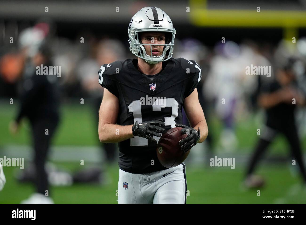 Las Vegas Raiders wide receiver Hunter Renfrow (13) warms up before an ...