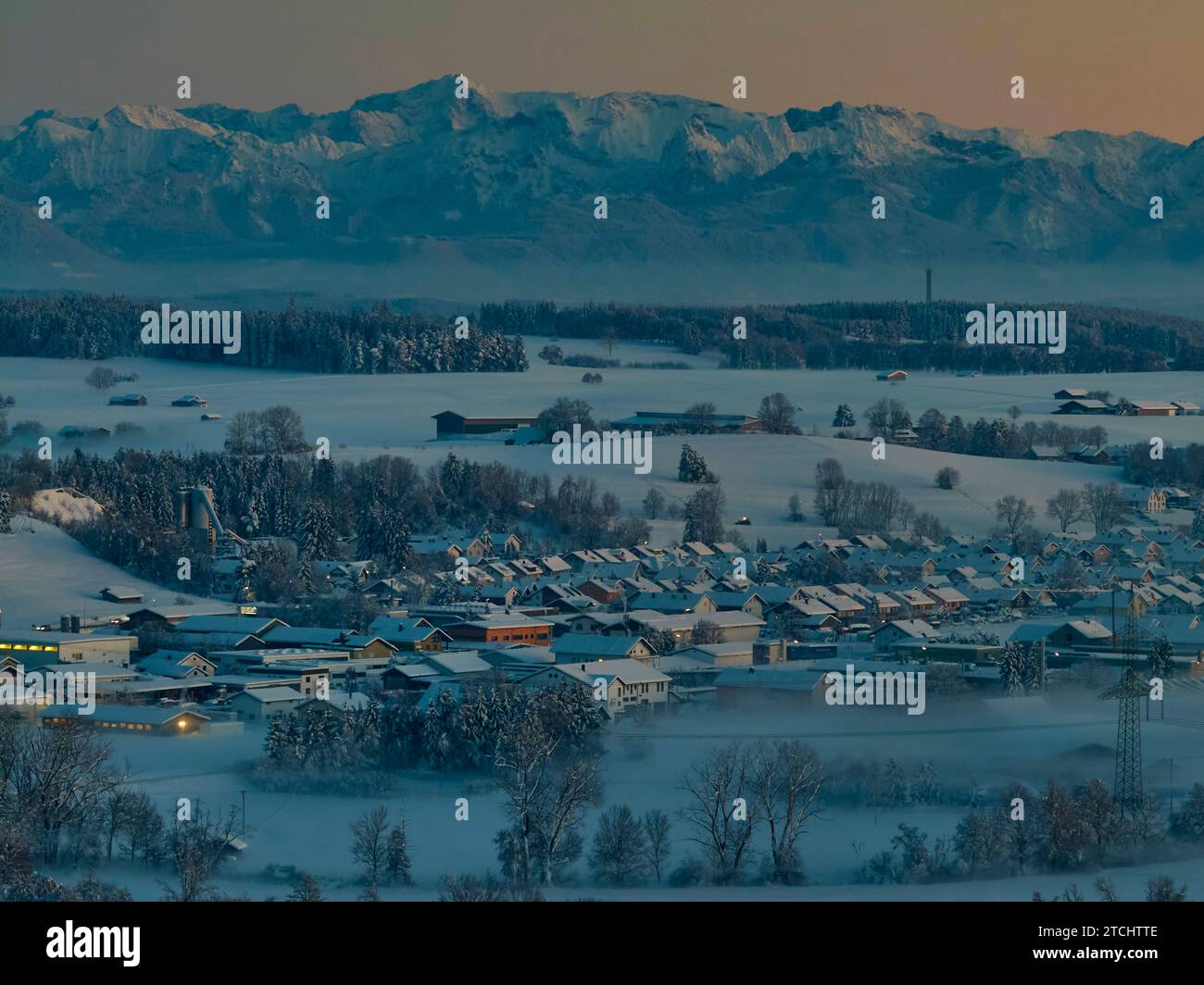 Drone photo of the Bavarian landscape with city view, with fog in the ...