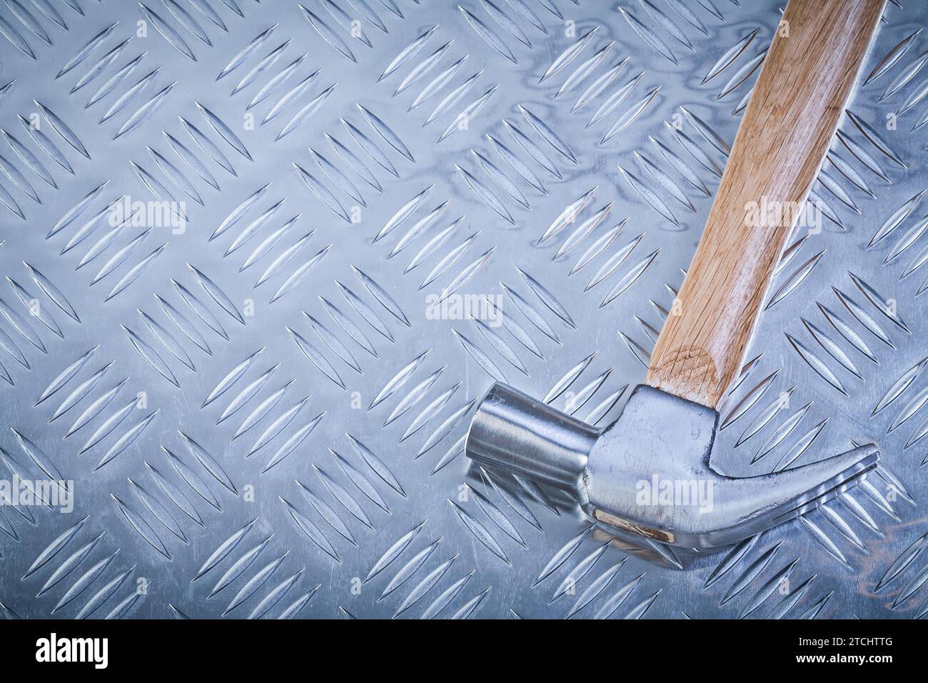 Claw hammer on grooved metal sheet Top view Design concept Stock Photo ...
