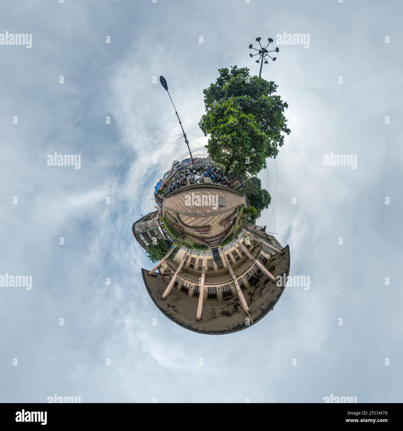 indian town on little planet in blue sky, transformation of spherical ...
