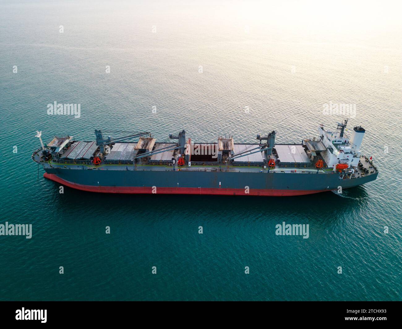 A massive cargo ship wood chips carrier in the sea, aerial view Stock ...