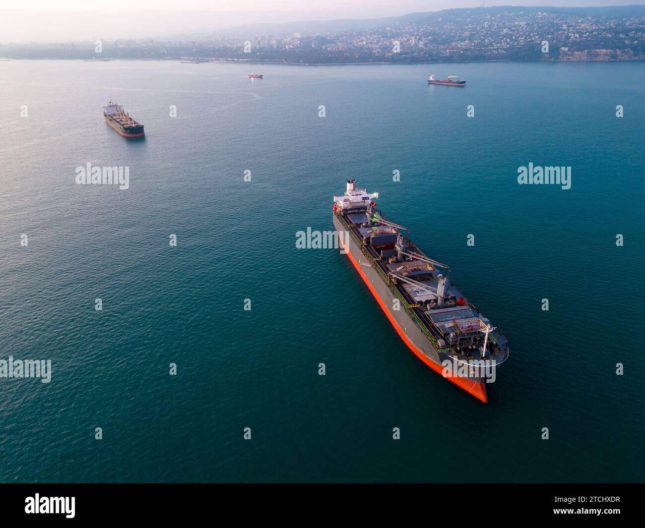 A massive cargo ship wood chips carrier in the sea, aerial view Stock ...