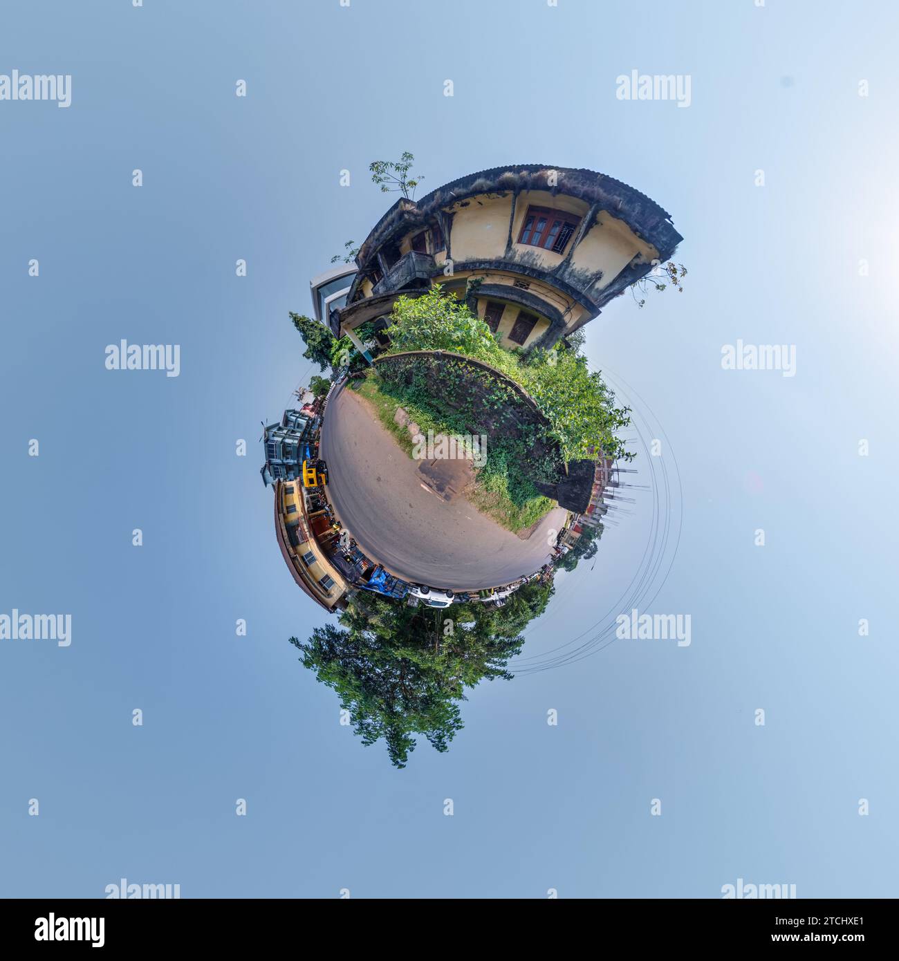 indian town on little planet in blue sky, transformation of spherical ...