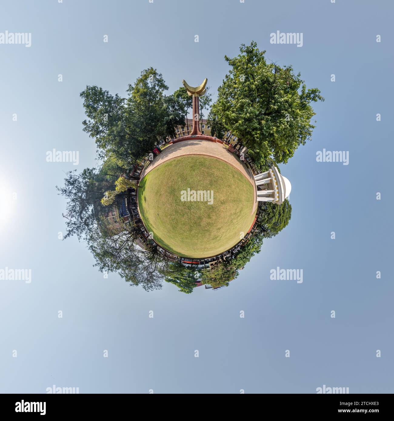 indian town on little planet in blue sky, transformation of spherical ...