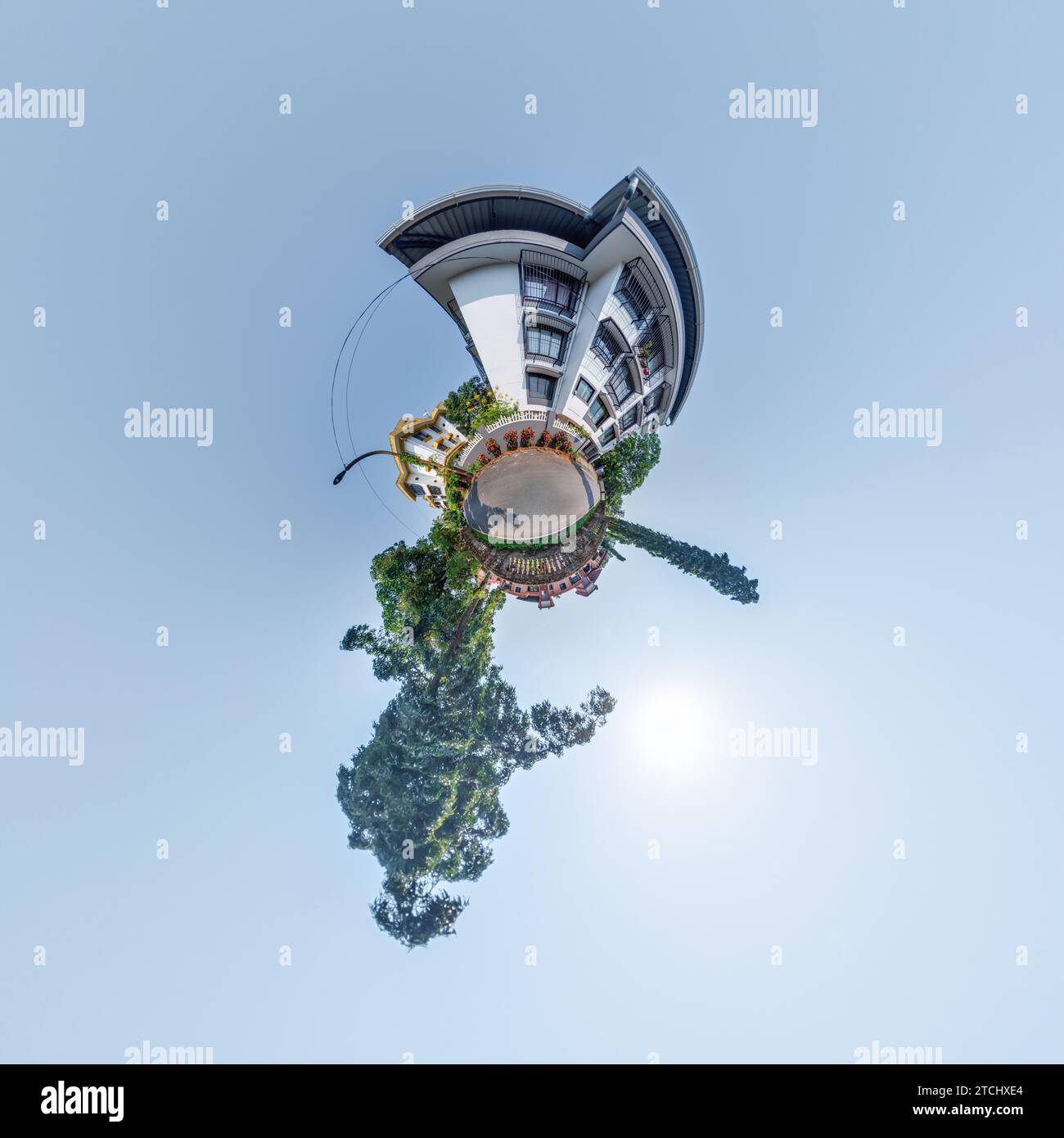 indian town on little planet in blue sky, transformation of spherical ...