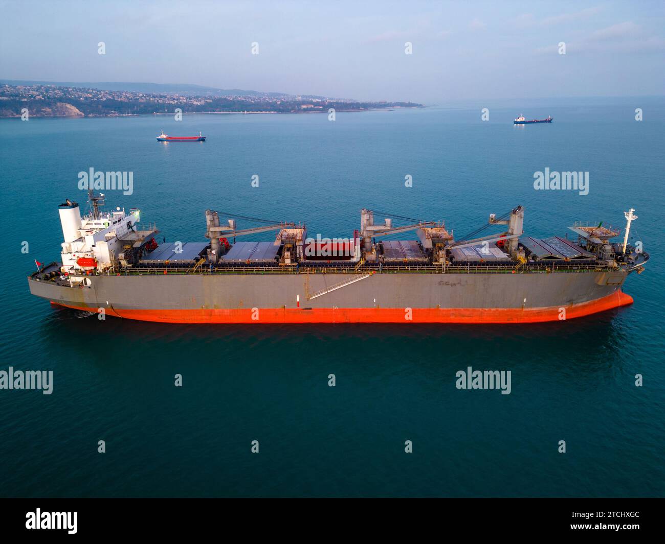 A massive cargo ship wood chips carrier in the sea, aerial view Stock ...