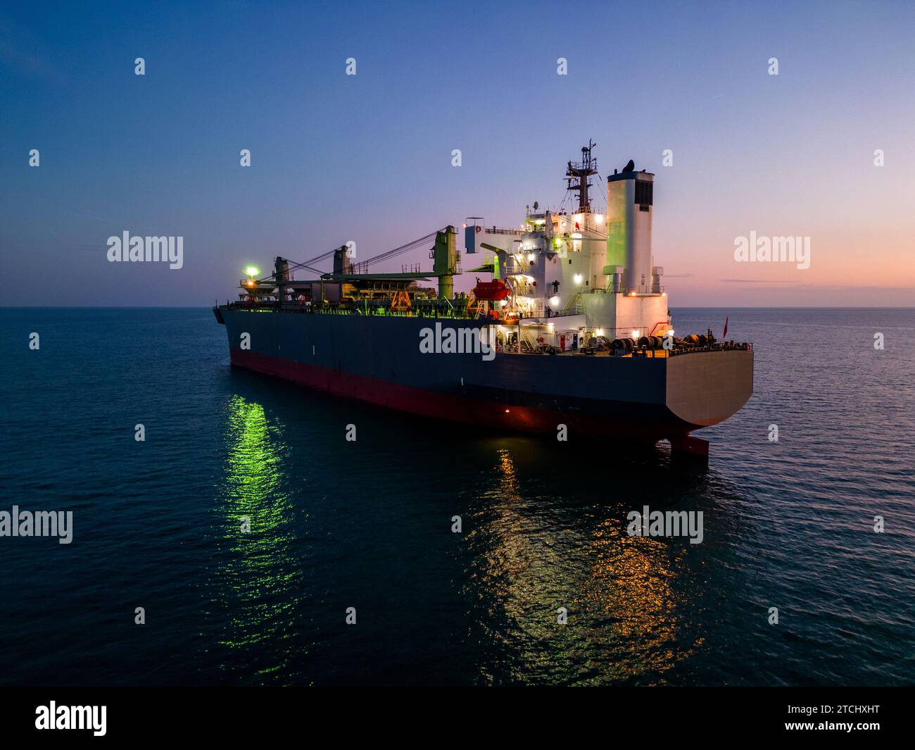 A massive cargo ship wood chips carrier in the sea, aerial view Stock ...