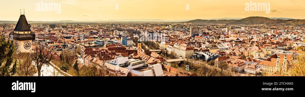 Panoramic view at Graz city with his famous buildings. River mur, clock ...