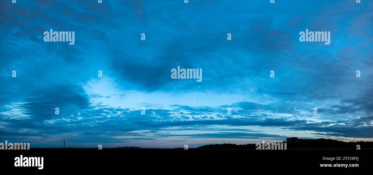 Blue dramatic sky panorama after sunset background. vivid and contrast ...
