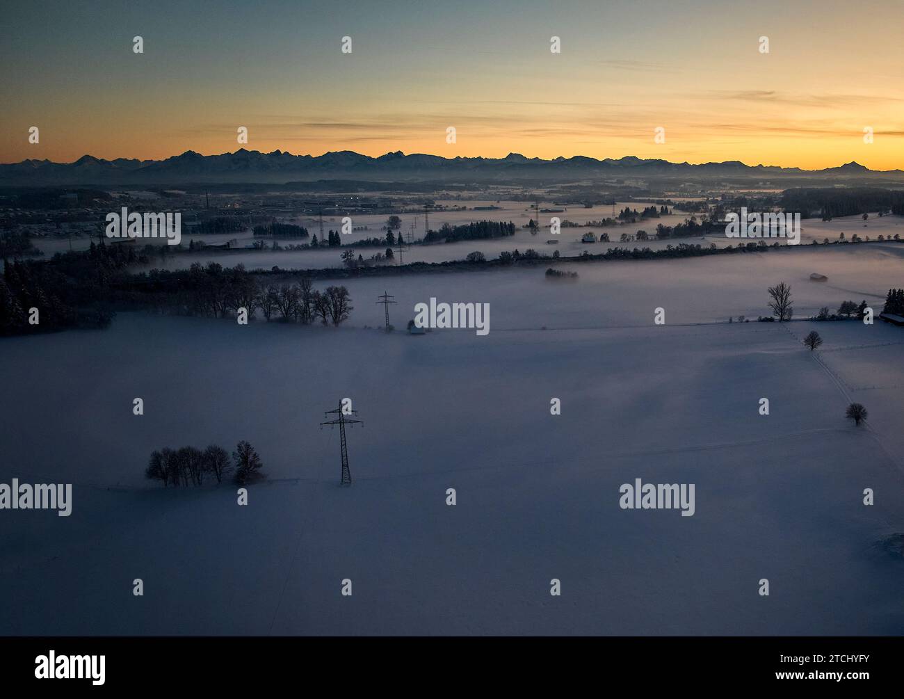 Drone photo of the Bavarian landscape with city view and power lines ...