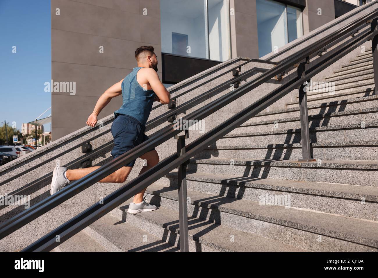 Man run up on stairs hi-res stock photography and images - Alamy