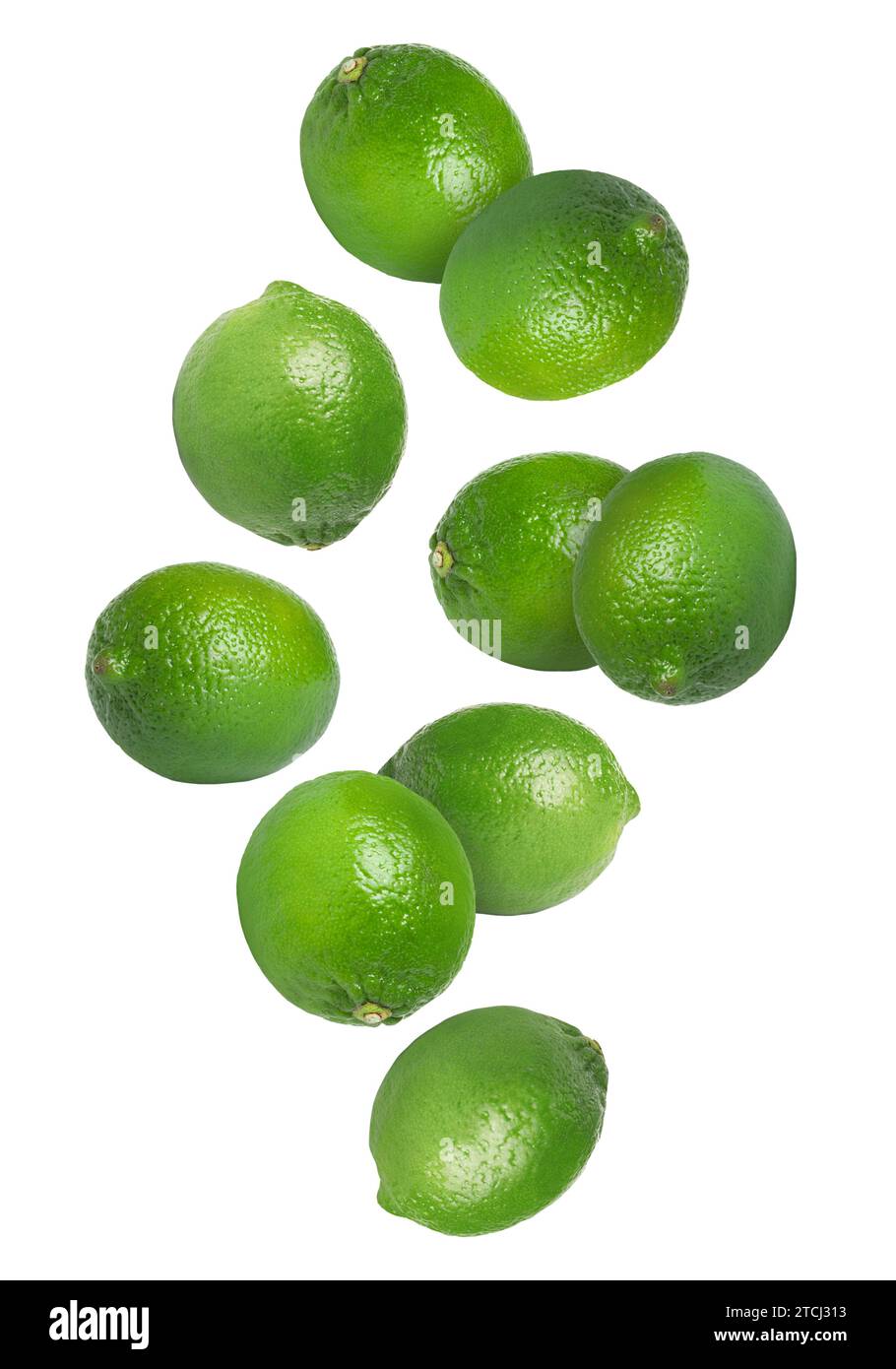 Fresh ripe limes falling on white background Stock Photo - Alamy