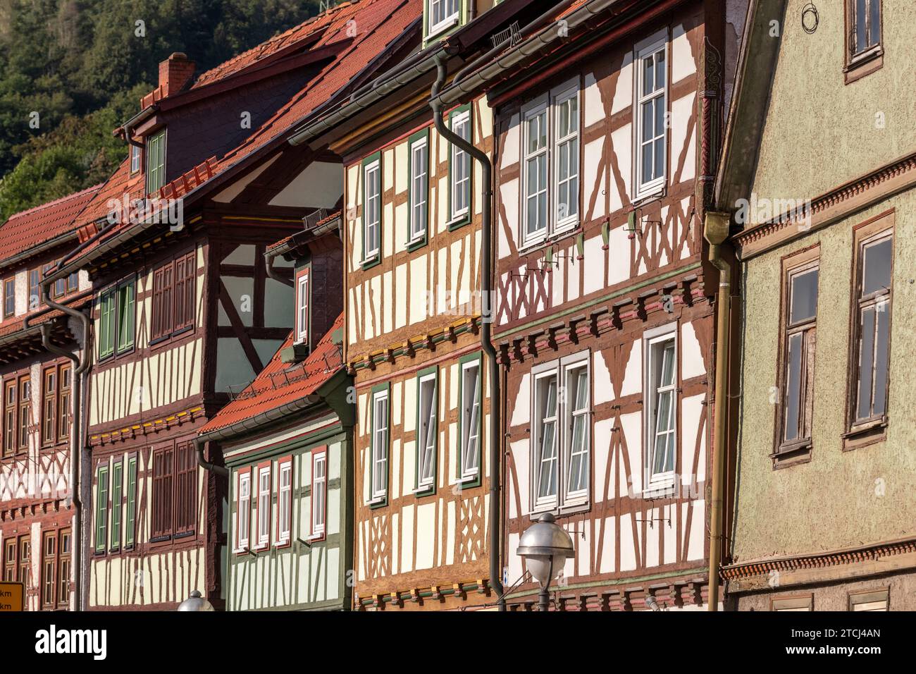 Street with facades of historical half-timbered houses in Wasungen ...