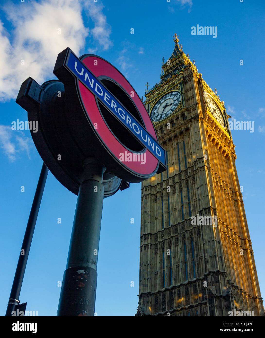 A picture of the Big Ben next to the Tube sign at Westminster Stock ...