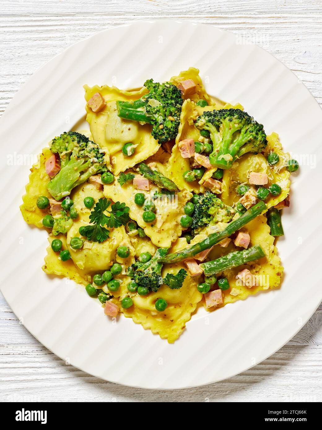italian ravioli with green vegetables, broccoli, green peas, asparagus ...