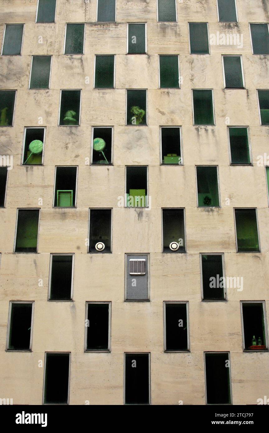 MODERN BUILDING FACADE WITH OBJECTS BEHIND GREEN WINDOWS - ARCHITECTURE ...