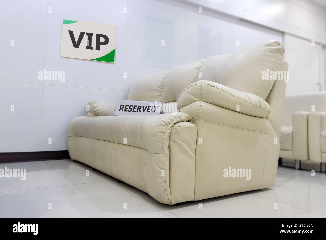 Luxury VIP sofa marked reserved Stock Photo - Alamy