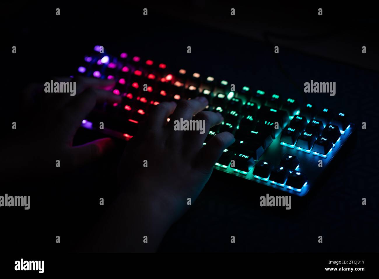 Neon computer keyboard with color backlight. Computer video games ...