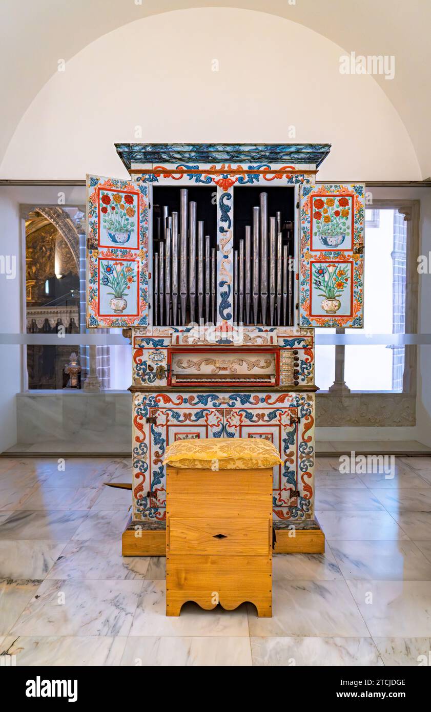 Restored organ with stool, decorated with floral motifs and painted ...